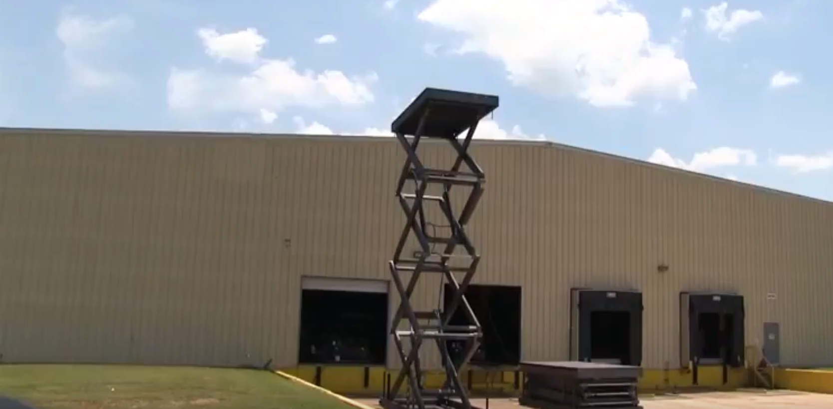 High Travel Tork 4 Scissors Lifts - Travels 50 Feet for Fireworks Display