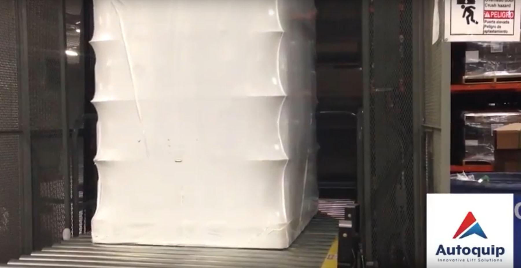 High Cycle Mechanical Freight Lift Conveys Crates of Wine