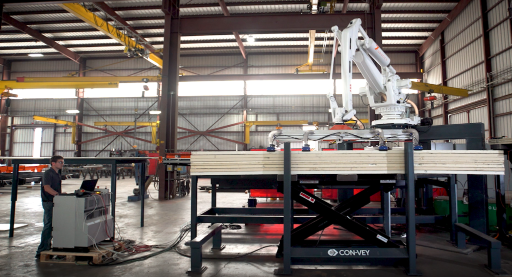 Heavy-Duty Scissor Lift Integrates with Robotic Stacking Line | Autoquip